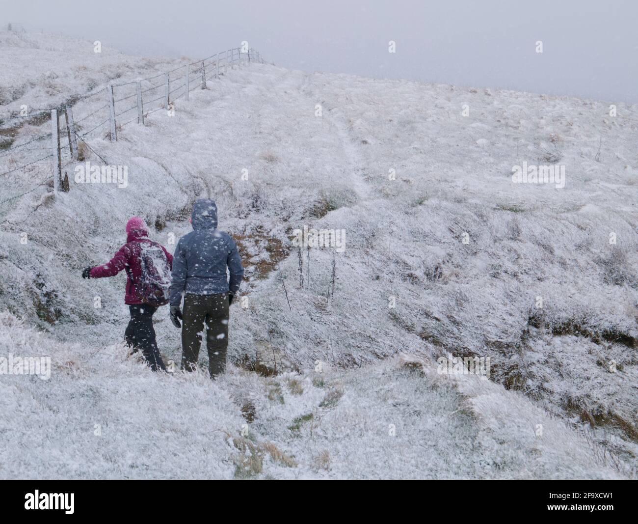 Hiking in cold weather hi-res stock photography and images - Alamy