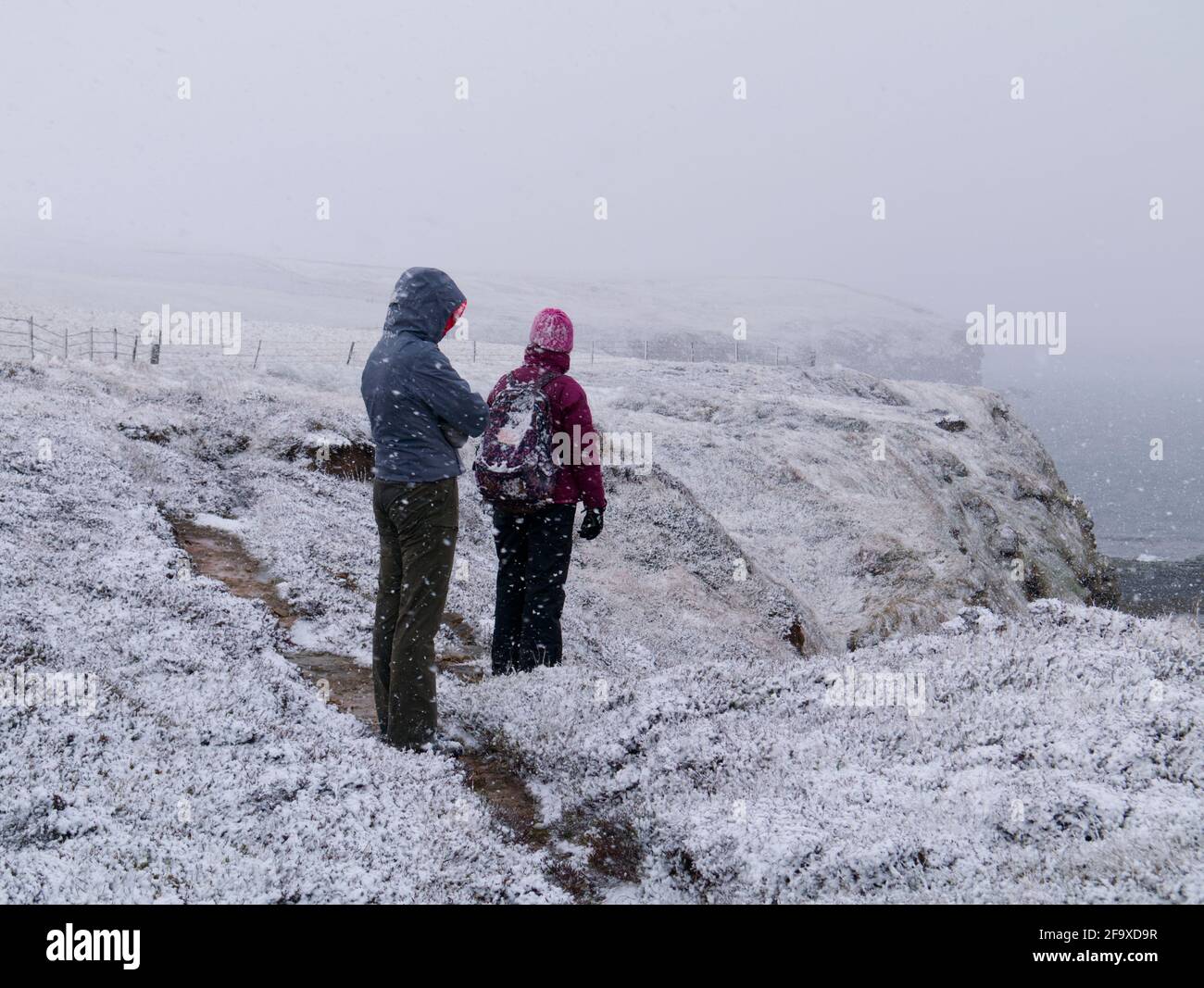 Hiking in cold weather hi-res stock photography and images - Alamy