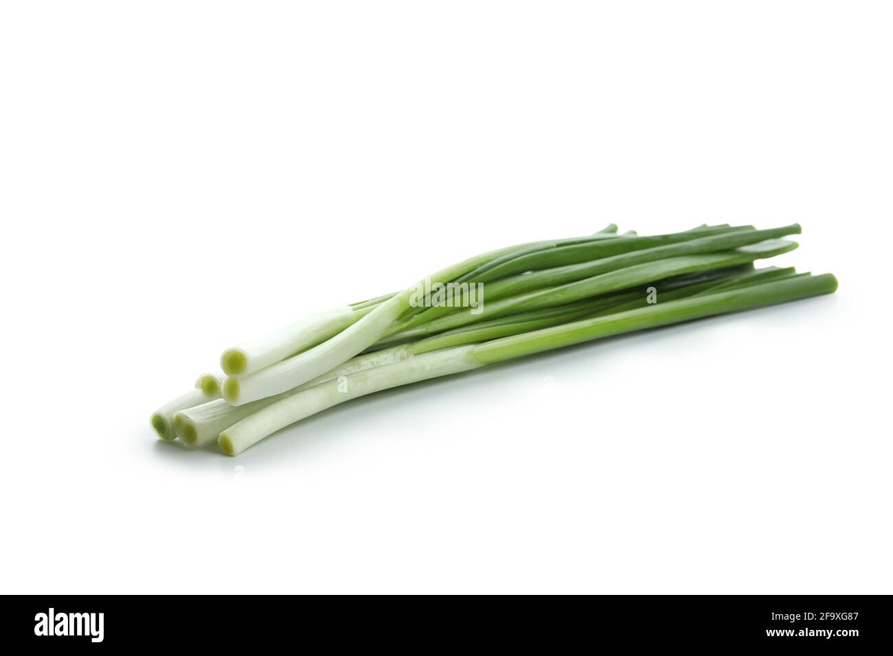 Fresh green onion isolated on white background Stock Photo - Alamy