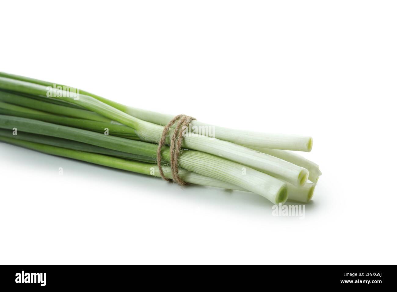 Fresh green onion isolated on white background Stock Photo - Alamy