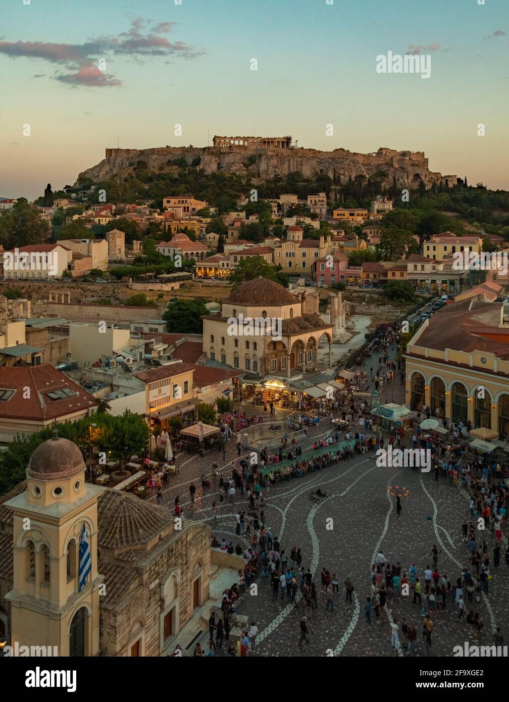 A picture of Monastiraki Square overlooked by the Acropolis of Athens ...