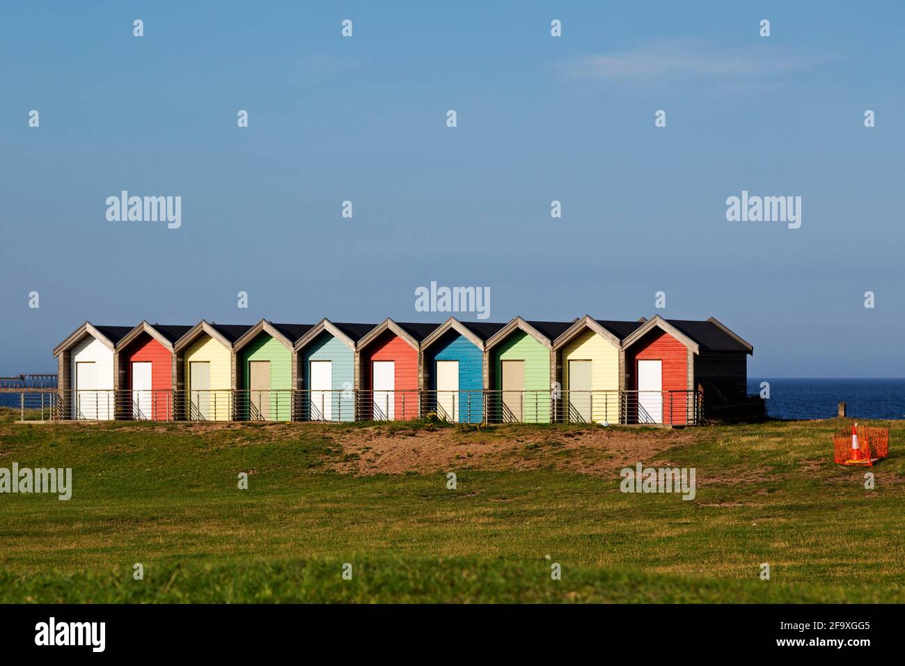 Colourful beach huts at Blyth Beach in Northumberland, England. The ...
