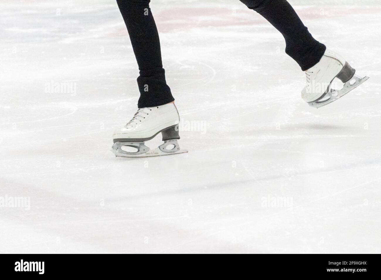 View of figure skater feet at the figure skating practice Stock Photo ...