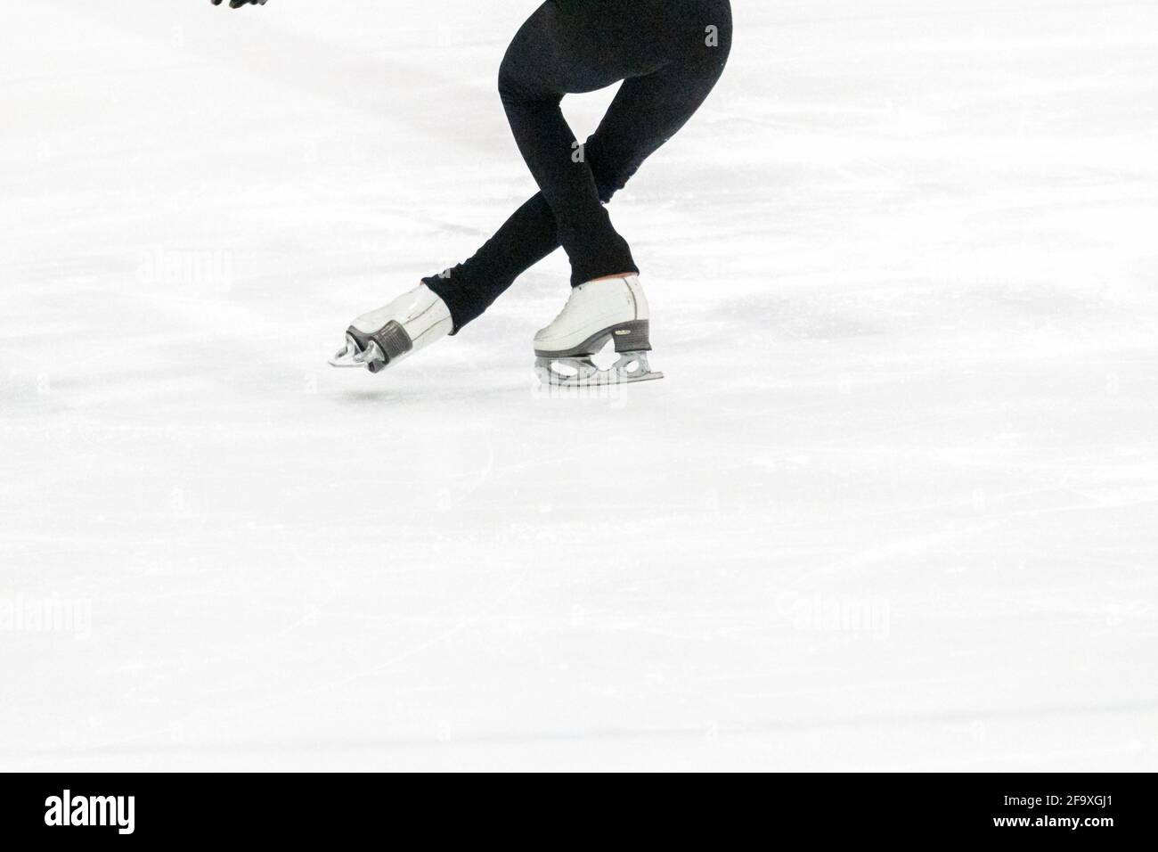 View of figure skater feet at the figure skating practice Stock Photo ...
