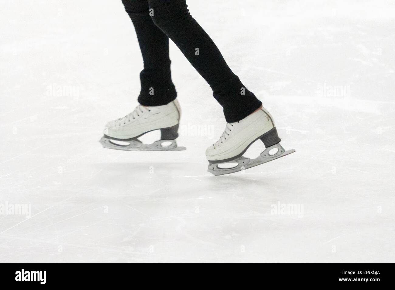 View of figure skater feet at the figure skating practice Stock Photo ...