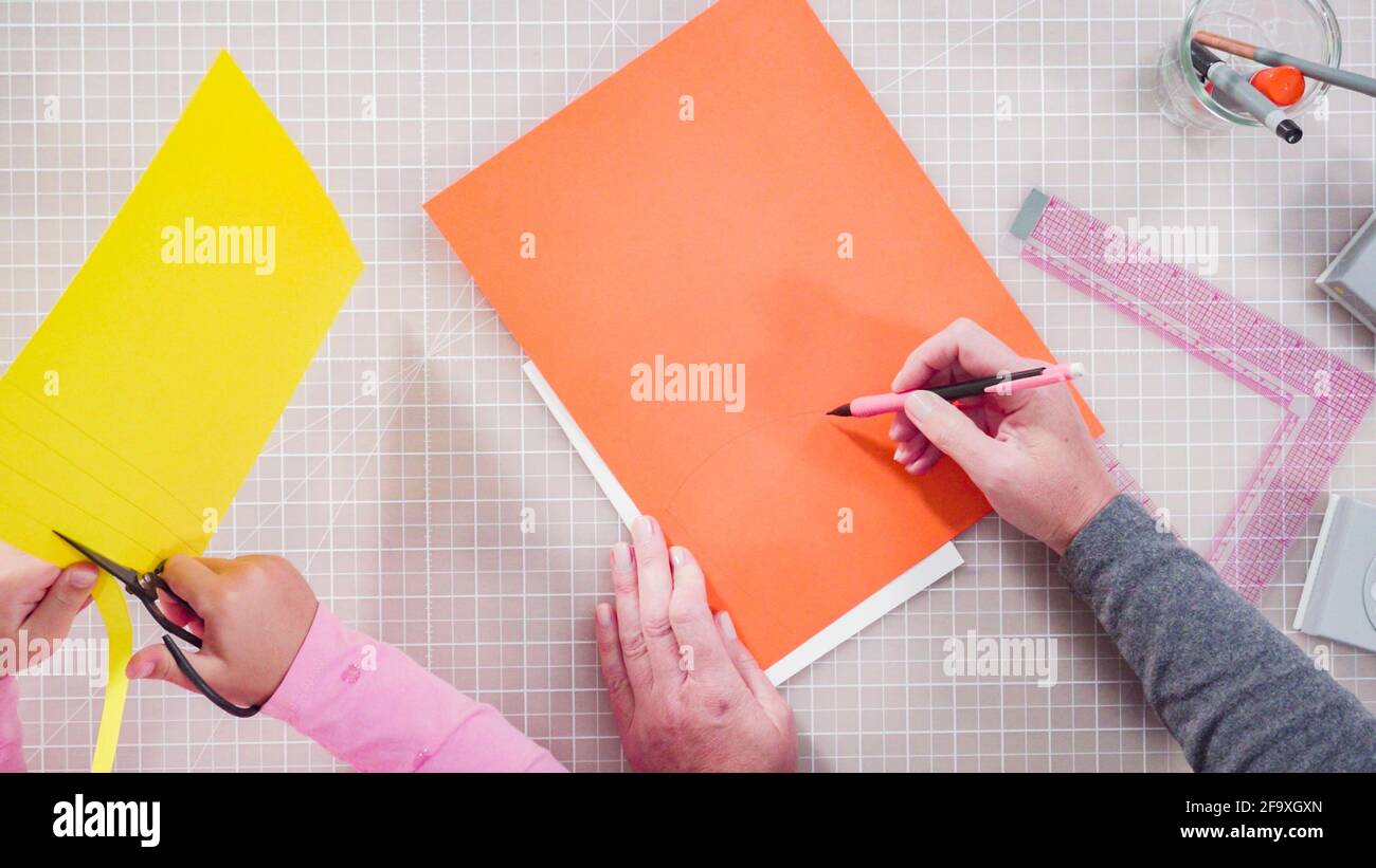 Flat lay. Little girl making a handmade Father's Day card from ...