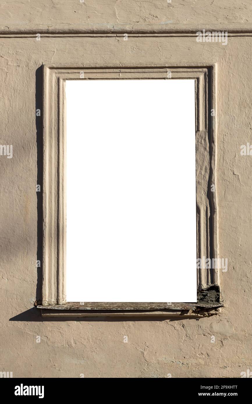 on an old stone wall a window of a residential house isolated on a ...