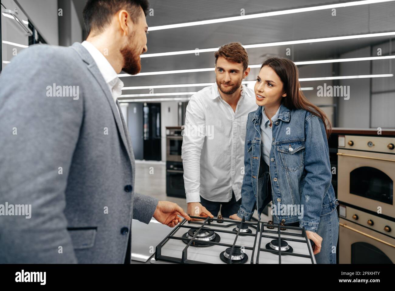 Positive couple choosing kitchen hi-res stock photography and images ...