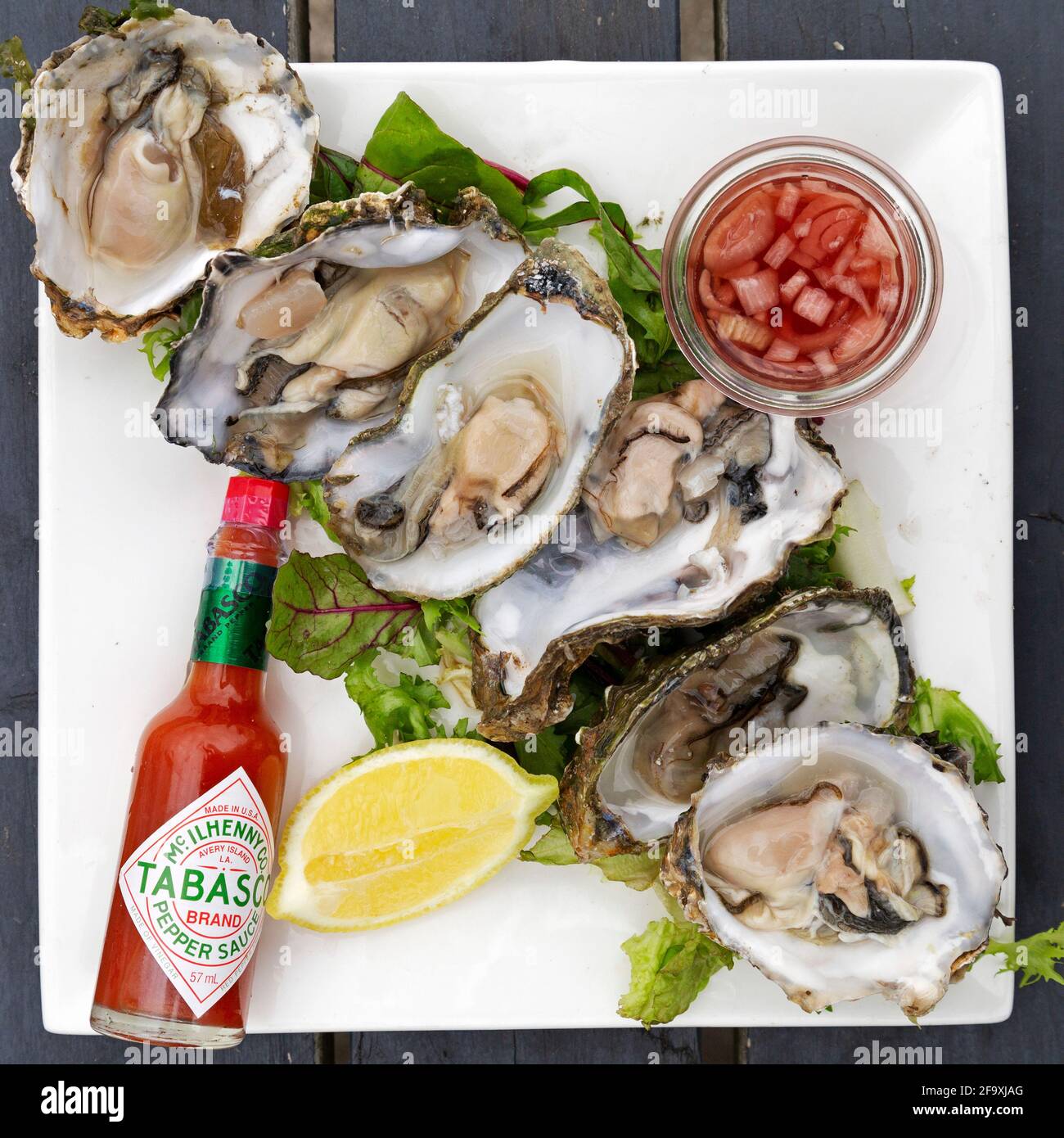 Tabasco and oysters hi-res stock photography and images - Alamy