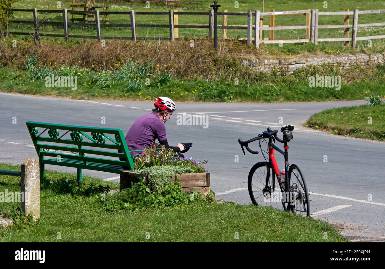 Bench cyclist hi-res stock photography and images - Alamy