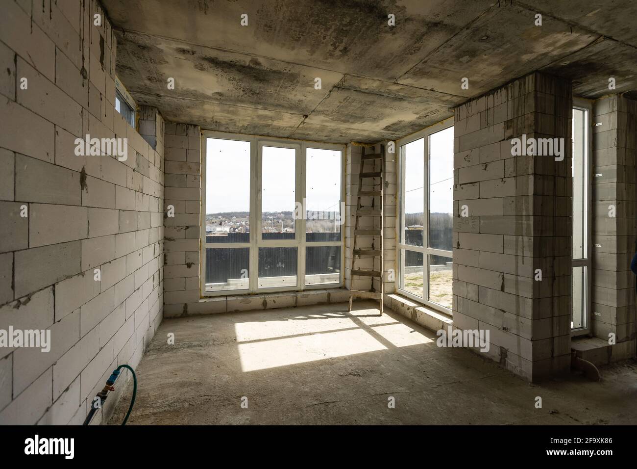 Interior construction of housing project patched without painting ...