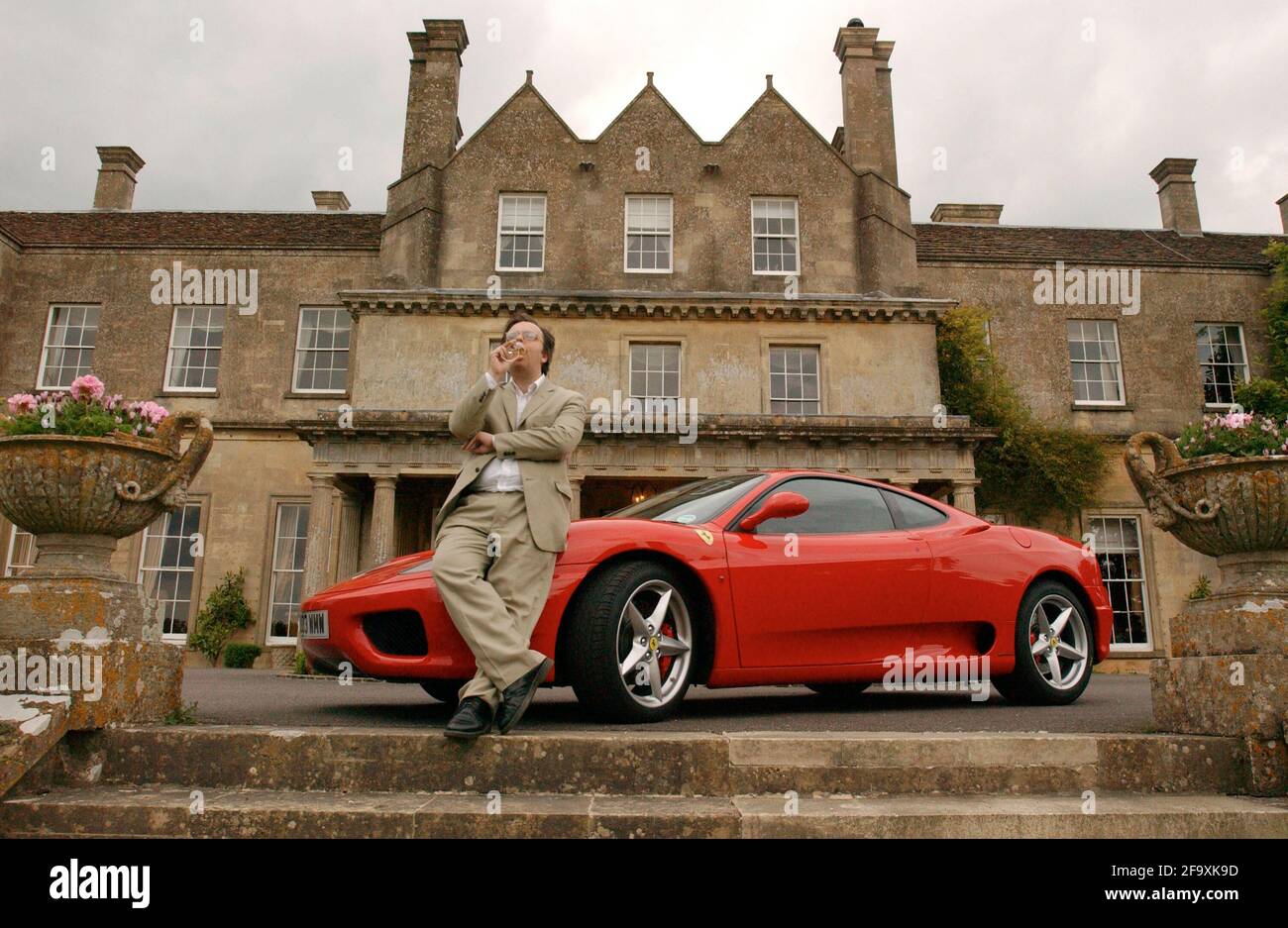 SEAN O'GRADY WITH A FERRARI AT LUCKHAM PARK HOTEL.14/6/05 TOM PILSTON ...