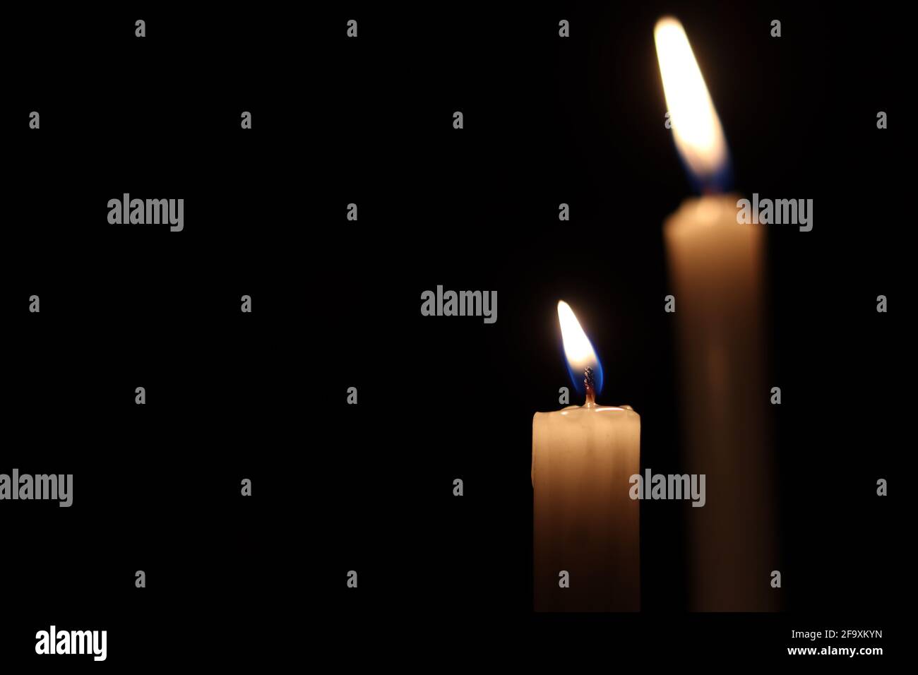 Burning candle with melting wax hi-res stock photography and images - Alamy