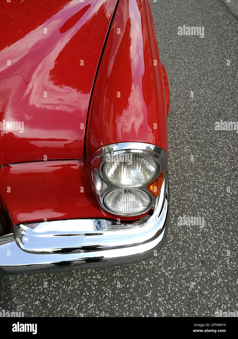Vertical shot of a headlight of an antique red car Stock Photo - Alamy