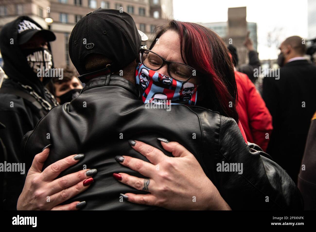 George Floyd's girlfriend, Courtney Ross is comforted during a press ...