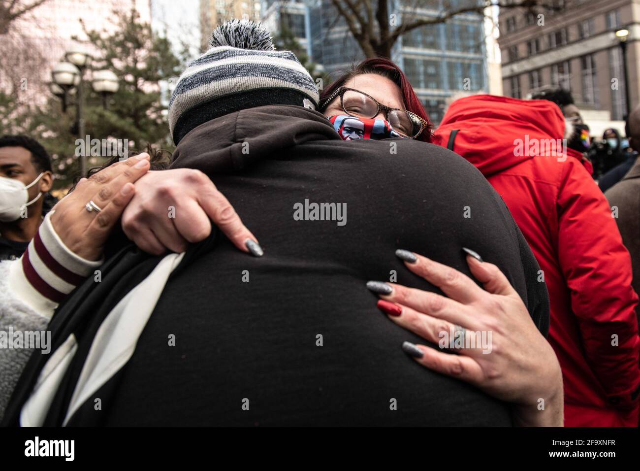 George Floyd's girlfriend, Courtney Ross is comforted during a press ...