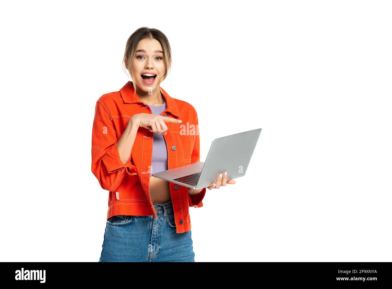 Amazed freelancer pointing laptop Cut Out Stock Images & Pictures - Alamy