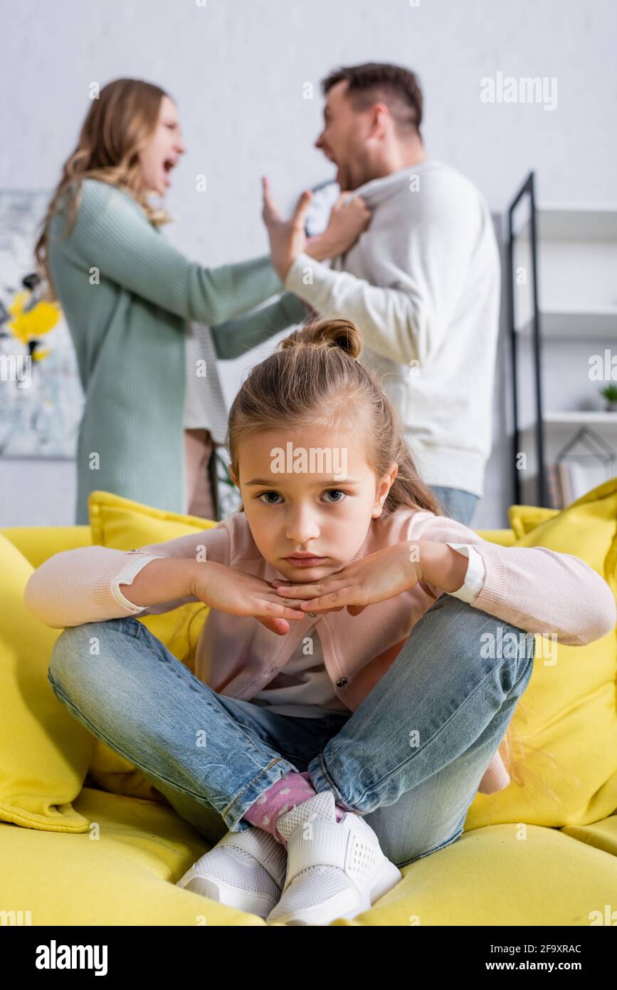 Sad kid sitting hi-res stock photography and images - Alamy