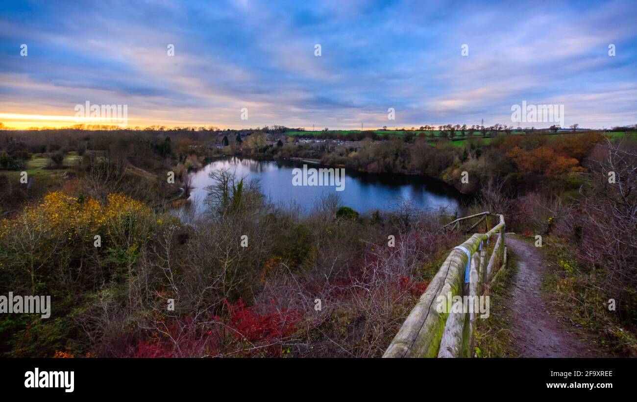 Aerial view of a walkway by the small pond Stock Photo - Alamy