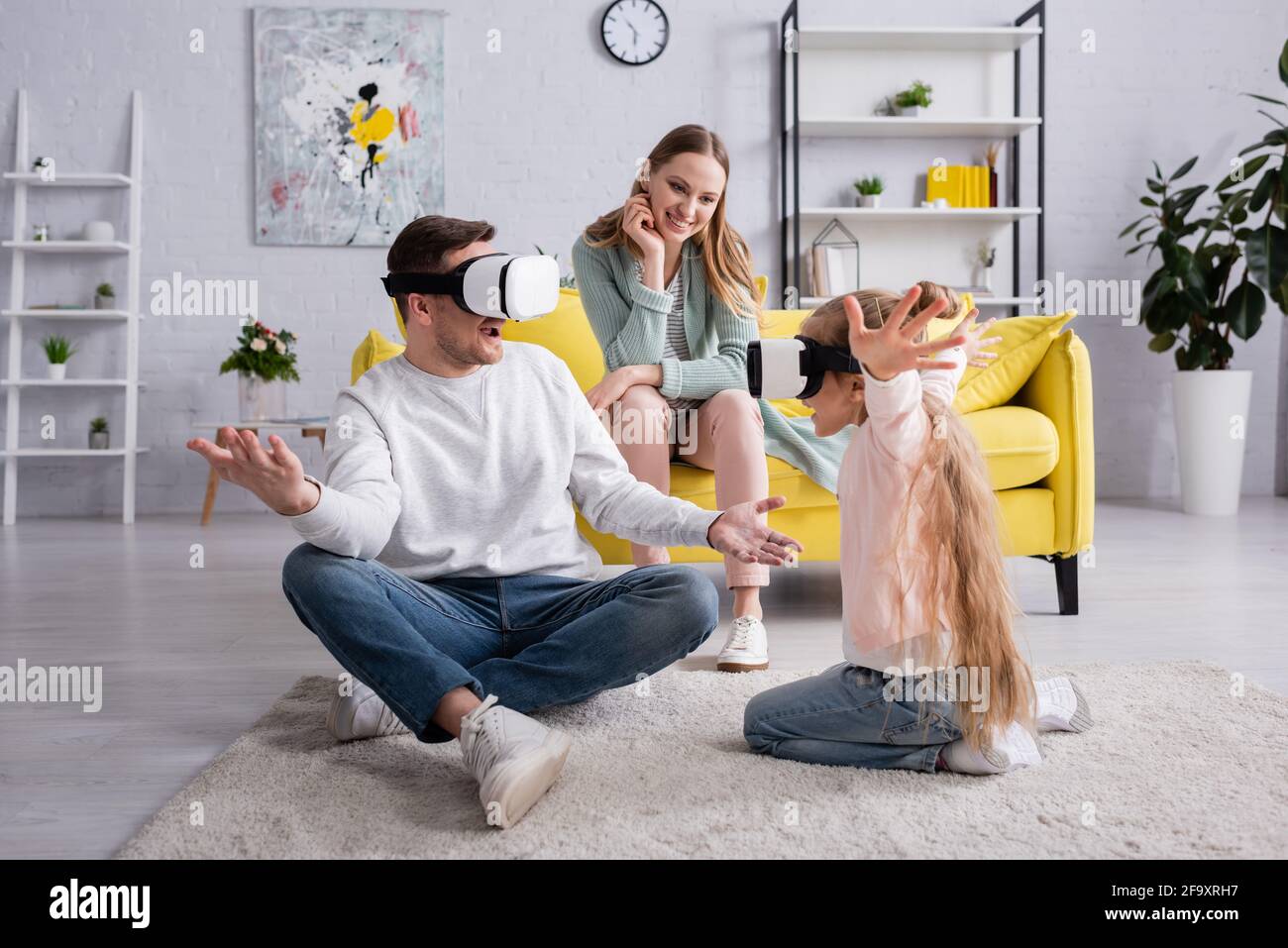 Mother daughter playing vr headsets hi-res stock photography and images ...