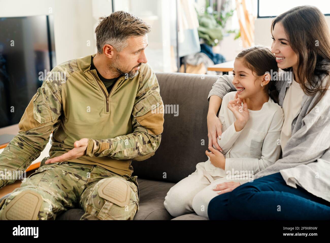 Happy family indoors hi-res stock photography and images - Alamy