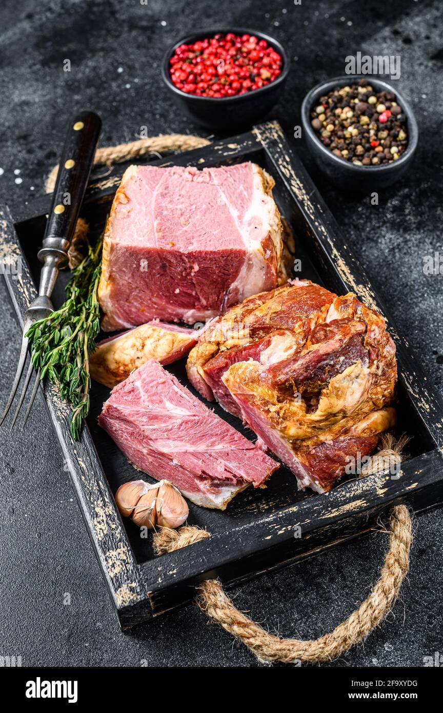 Smoked Sliced Pork Slab Bacon Meat in a wooden tray. Black background ...