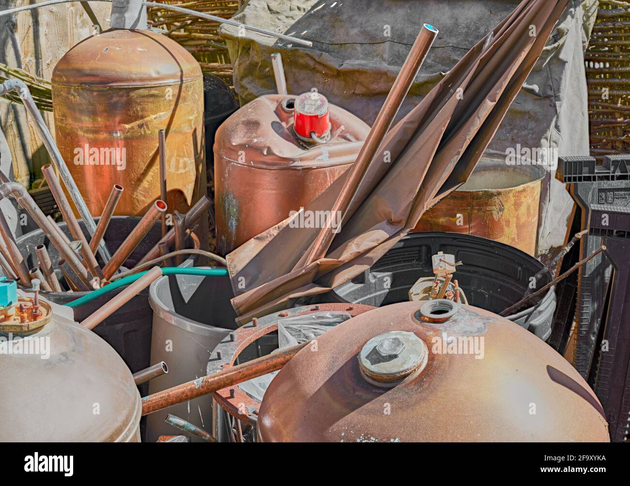 Collection of disused copper water tanks Stock Photo - Alamy