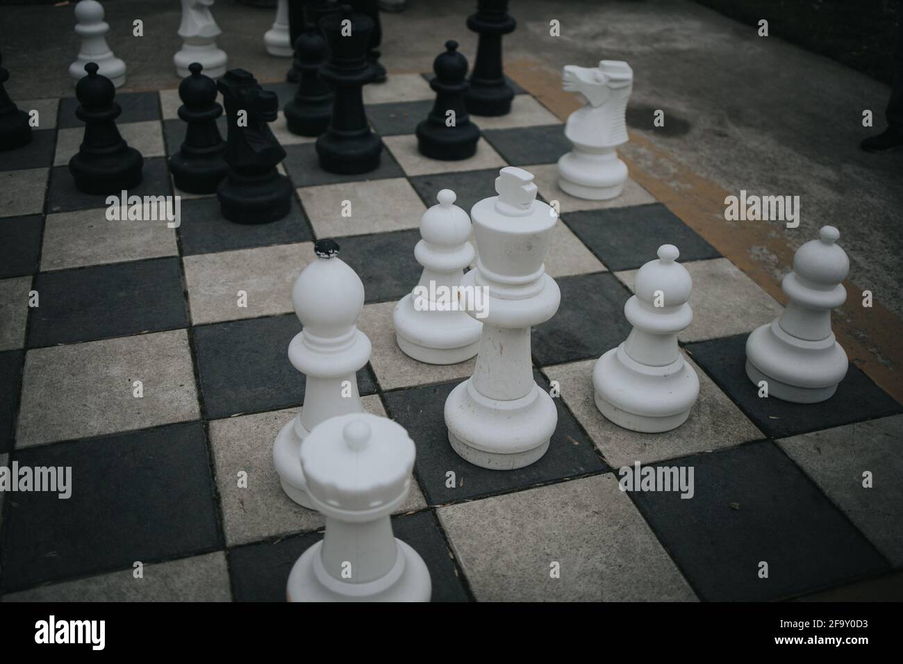 Beautiful view of a giant size chess game in the street Stock Photo - Alamy