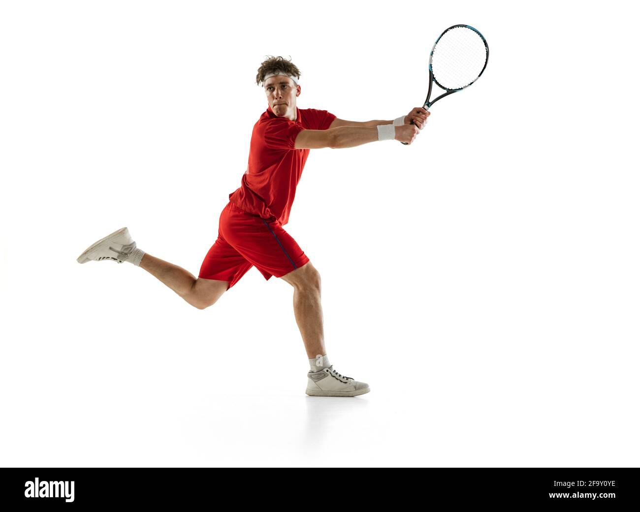 One Caucasian man, professional tennis player isolated on white ...