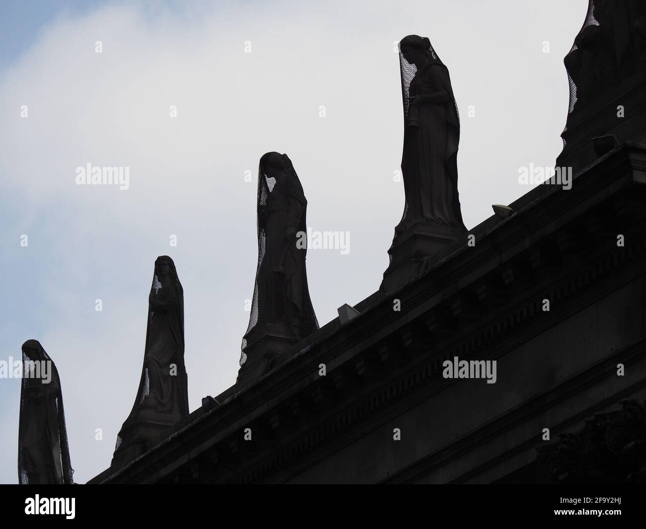 Statue under Netting Stock Photo - Alamy