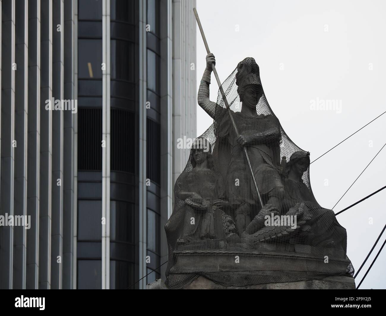 Statue under Netting Stock Photo - Alamy