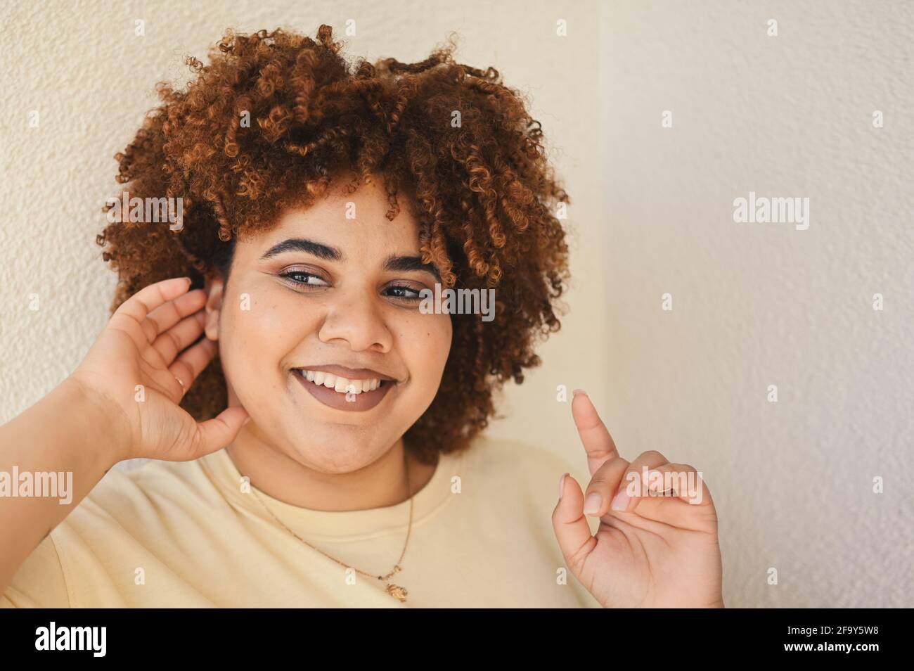 Beautiful happy smiling curvy plus size African black woman afro hair ...