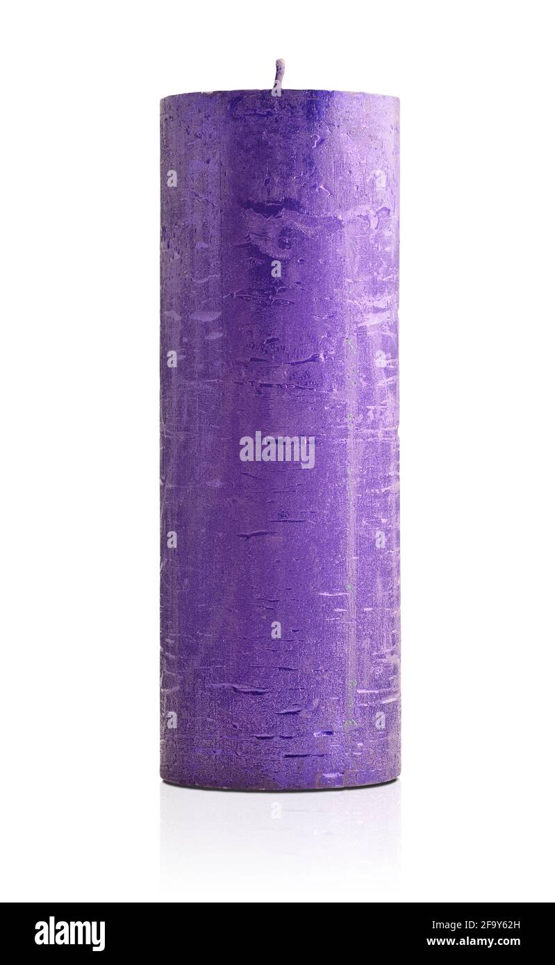 Large violet candle with a rough texture Stock Photo - Alamy
