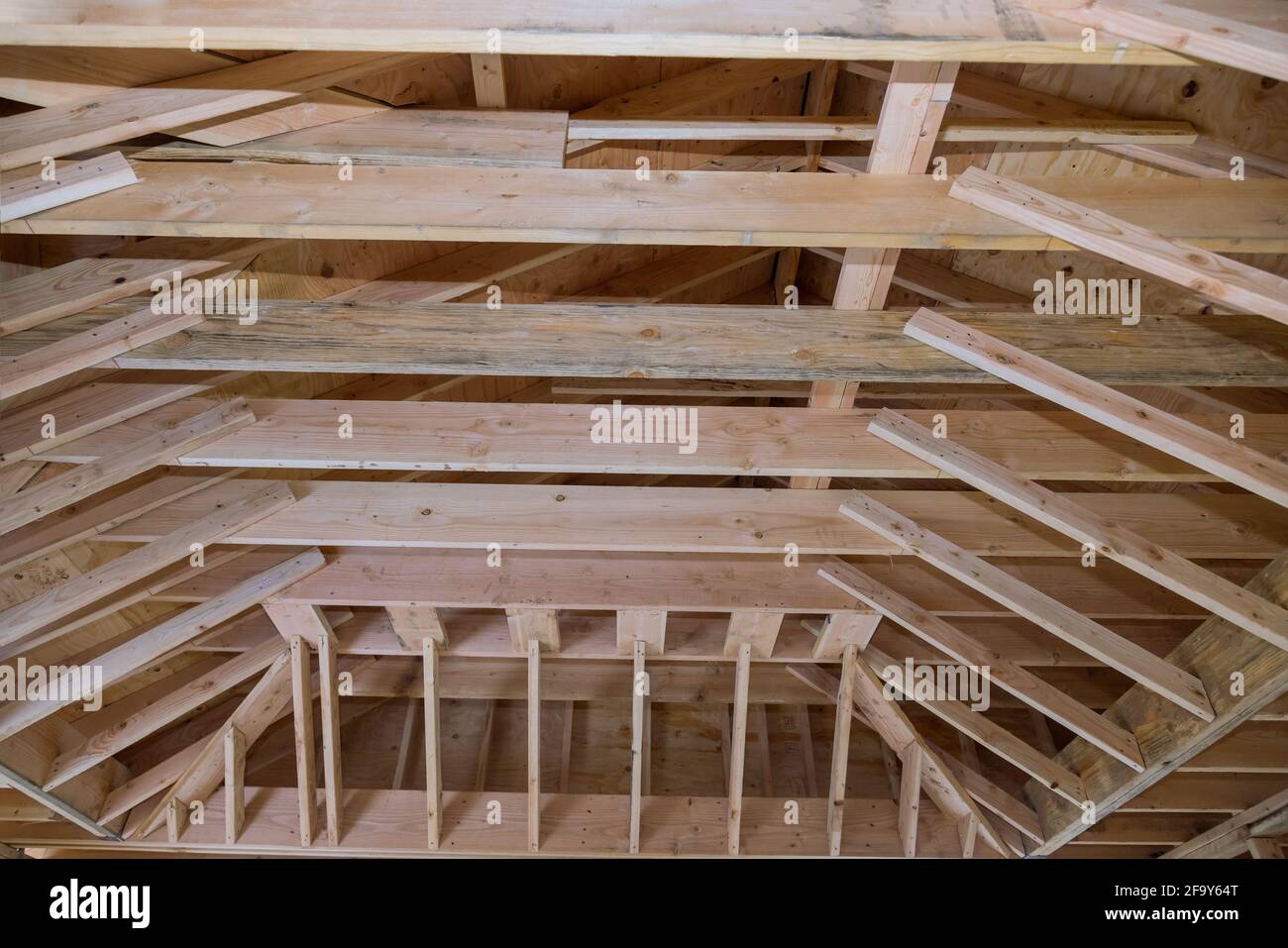 Roof wood framework construction in progress new residential beam of ...