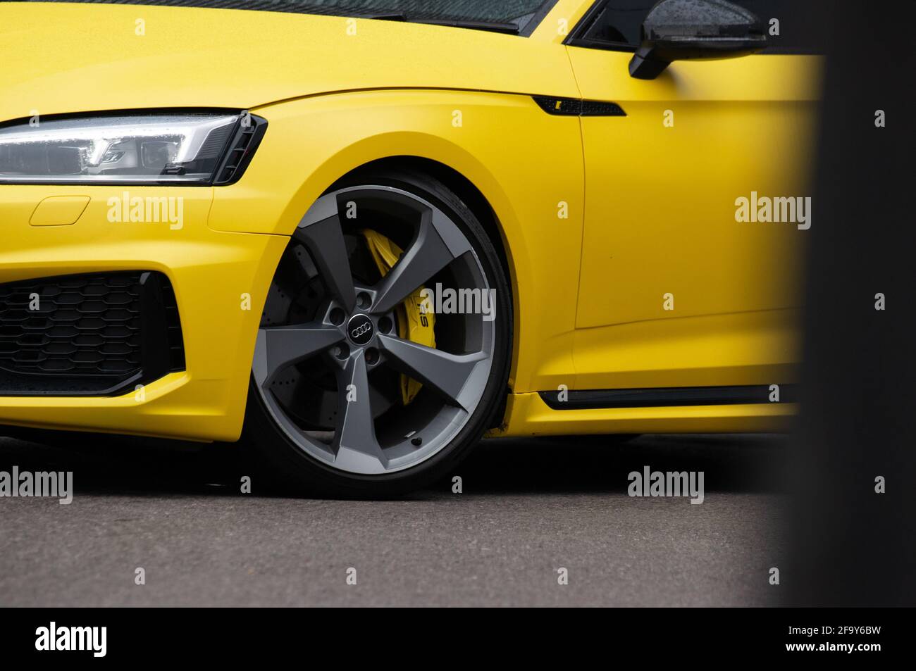 Audi RS5 Yellow metal background Stock Photo - Alamy