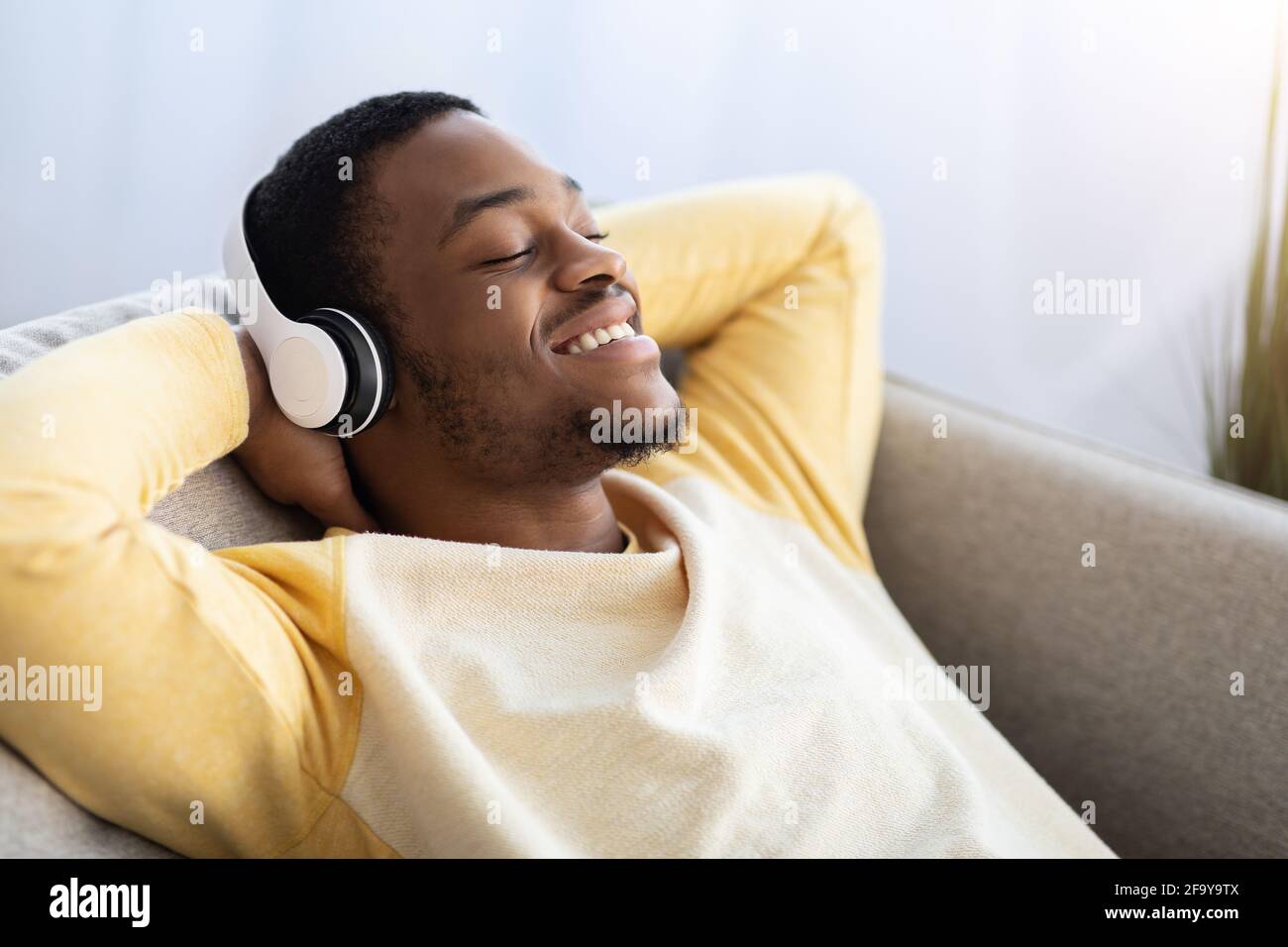 Black Man Listening To Music