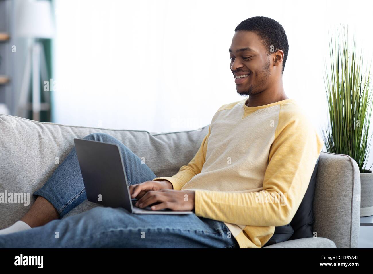 Relaxed black guy using hi-res stock photography and images - Alamy