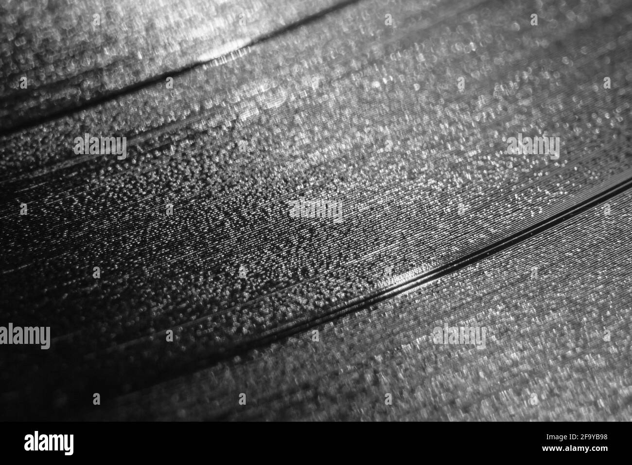 The texture of a vinyl record in macro photography. Selective focus ...