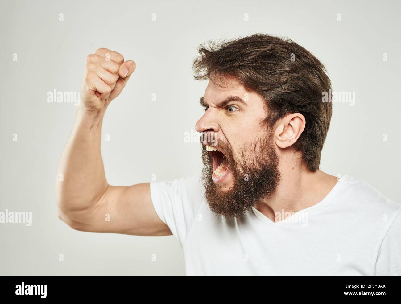 aggressive men outrage stress cry bushy beard Stock Photo - Alamy