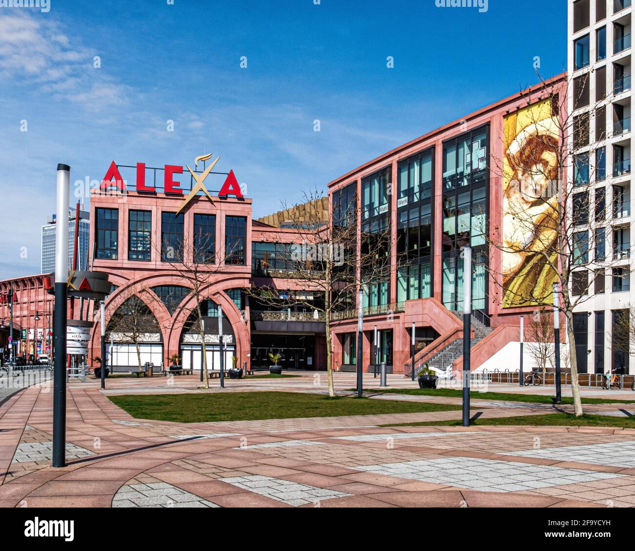 Alexa shopping centre. Pink arcaded Art Deco style building by ...
