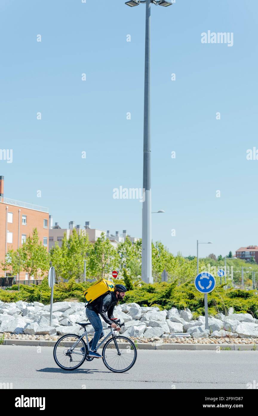 food delivery boy on the street Stock Photo - Alamy