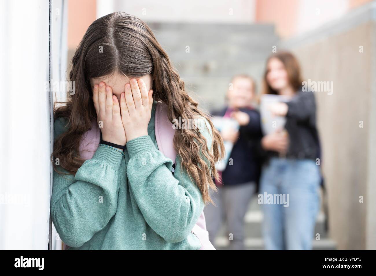 Girl being bullied at the school. Educational school isolation and ...