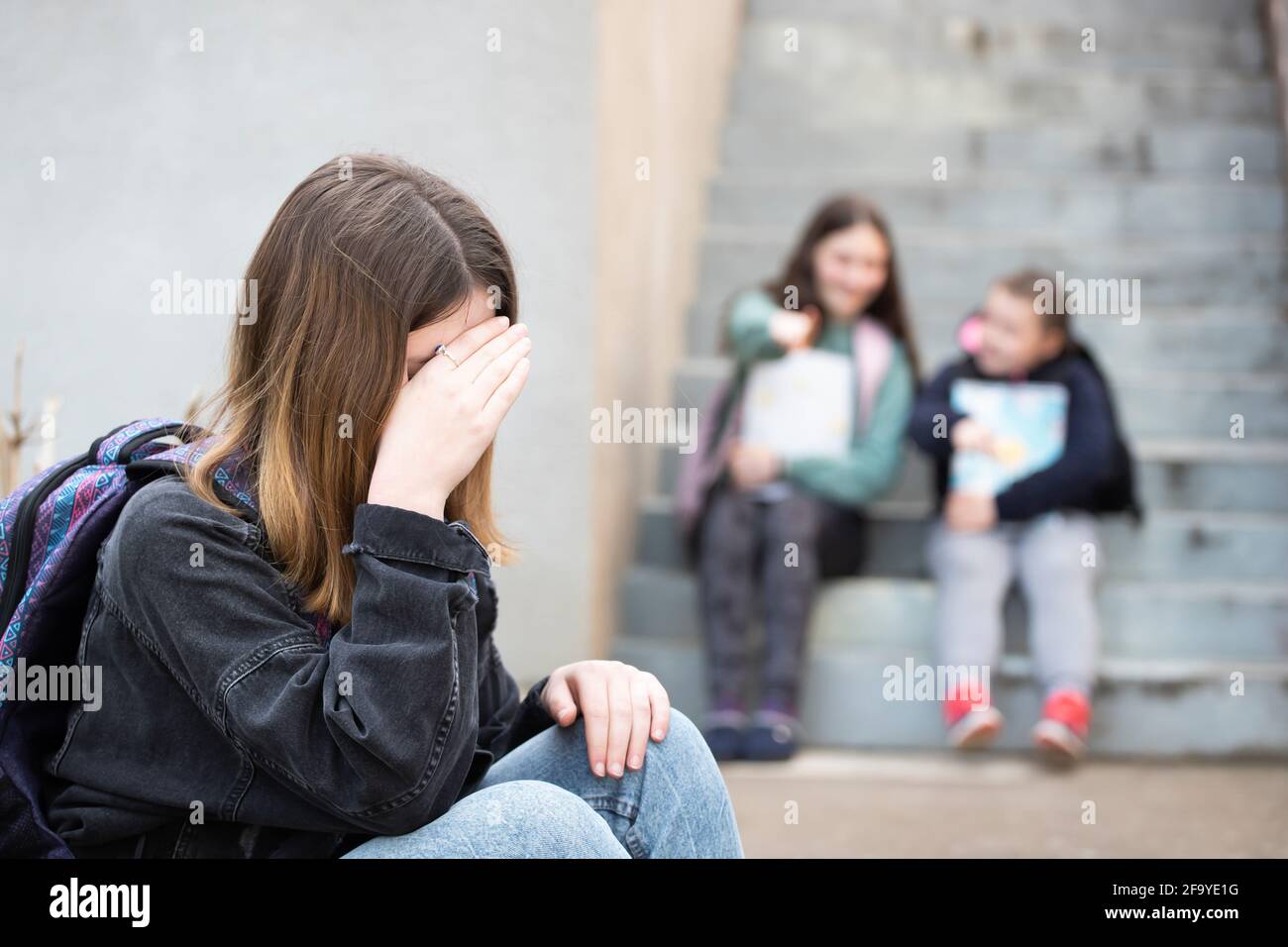 Girl being bullied at the school. Educational school isolation and ...
