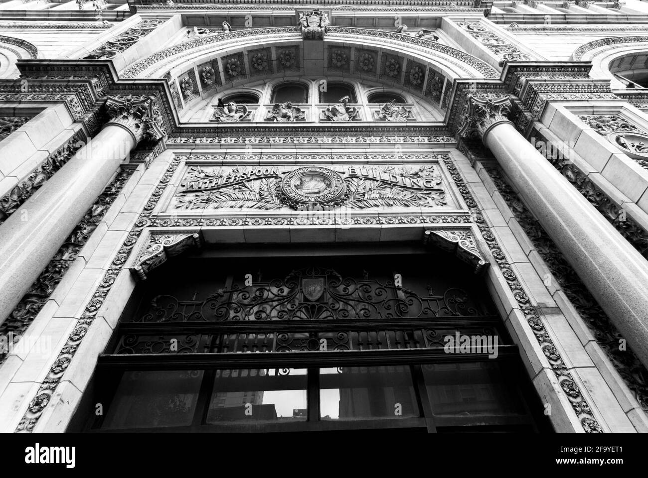 The highly decorative, ornate, arched, stone doorway of the Witherspoon ...