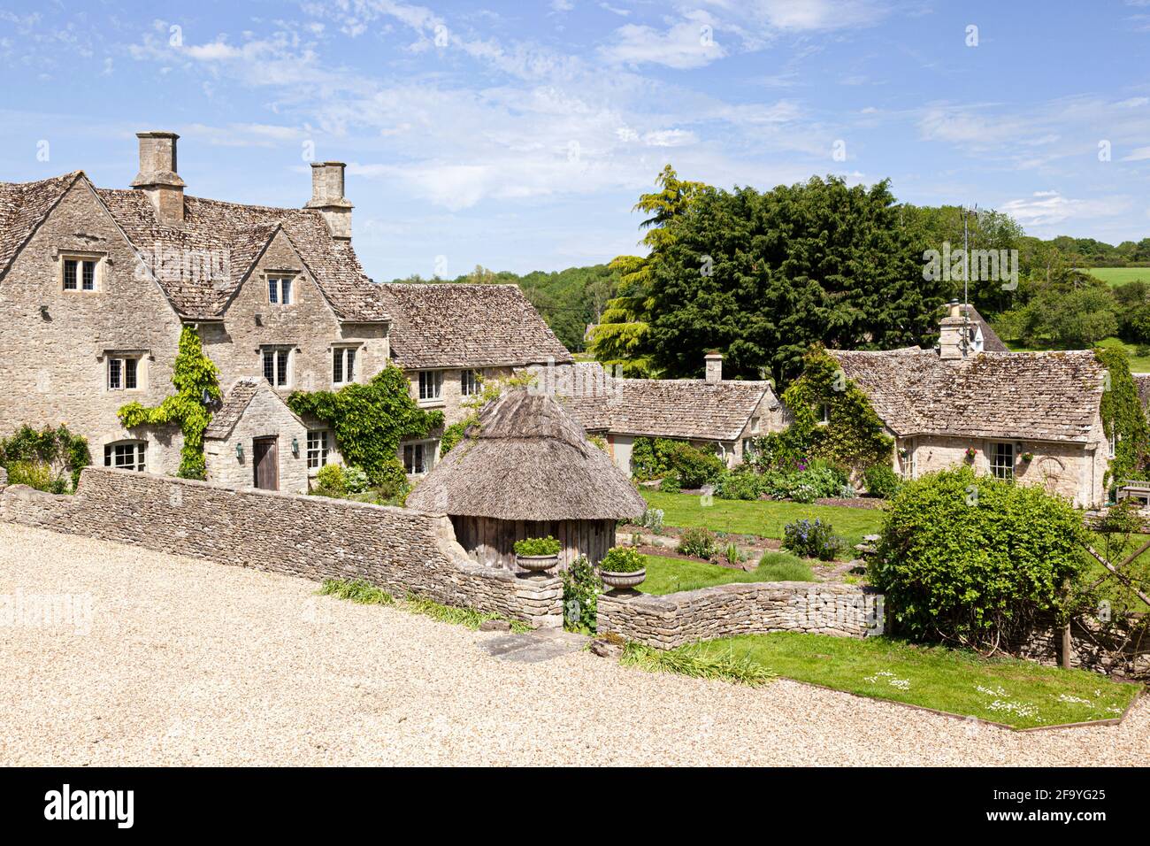 A traditional old farmhouse in the Cotswold village of Coln Rogers ...
