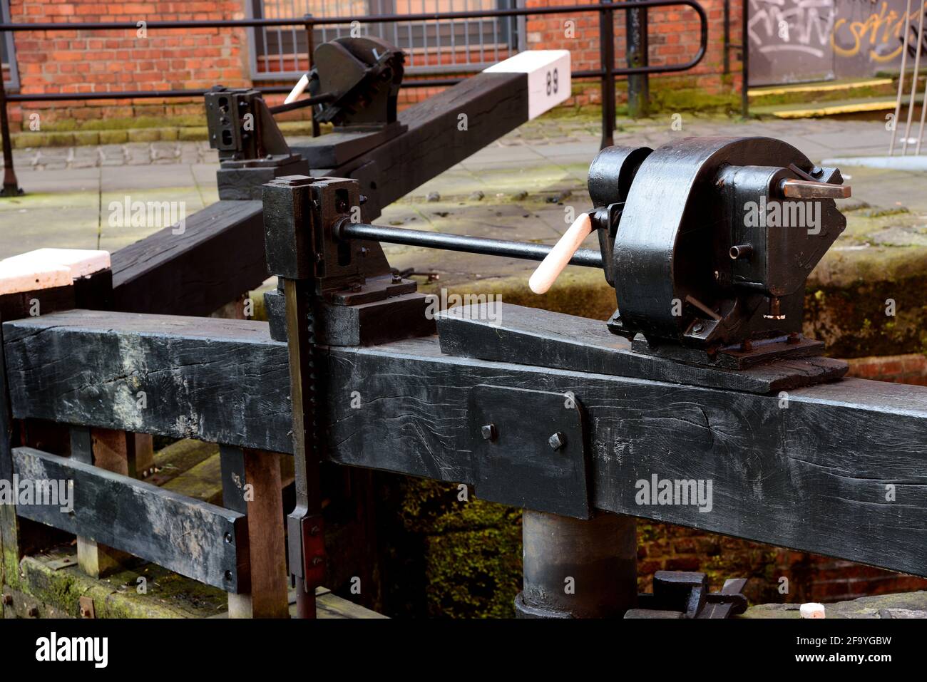 Canal lock gates machinery Stock Photo - Alamy