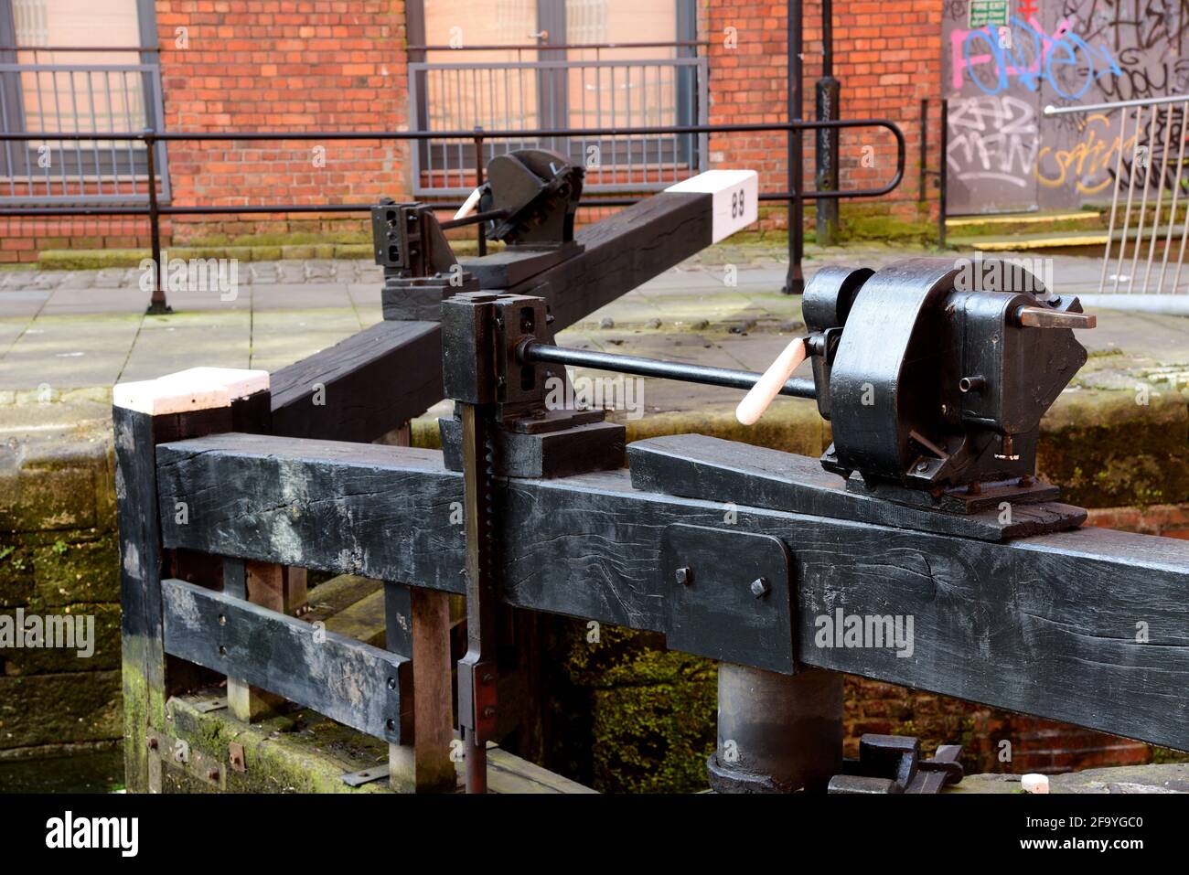 Canal lock gates machinery Stock Photo - Alamy
