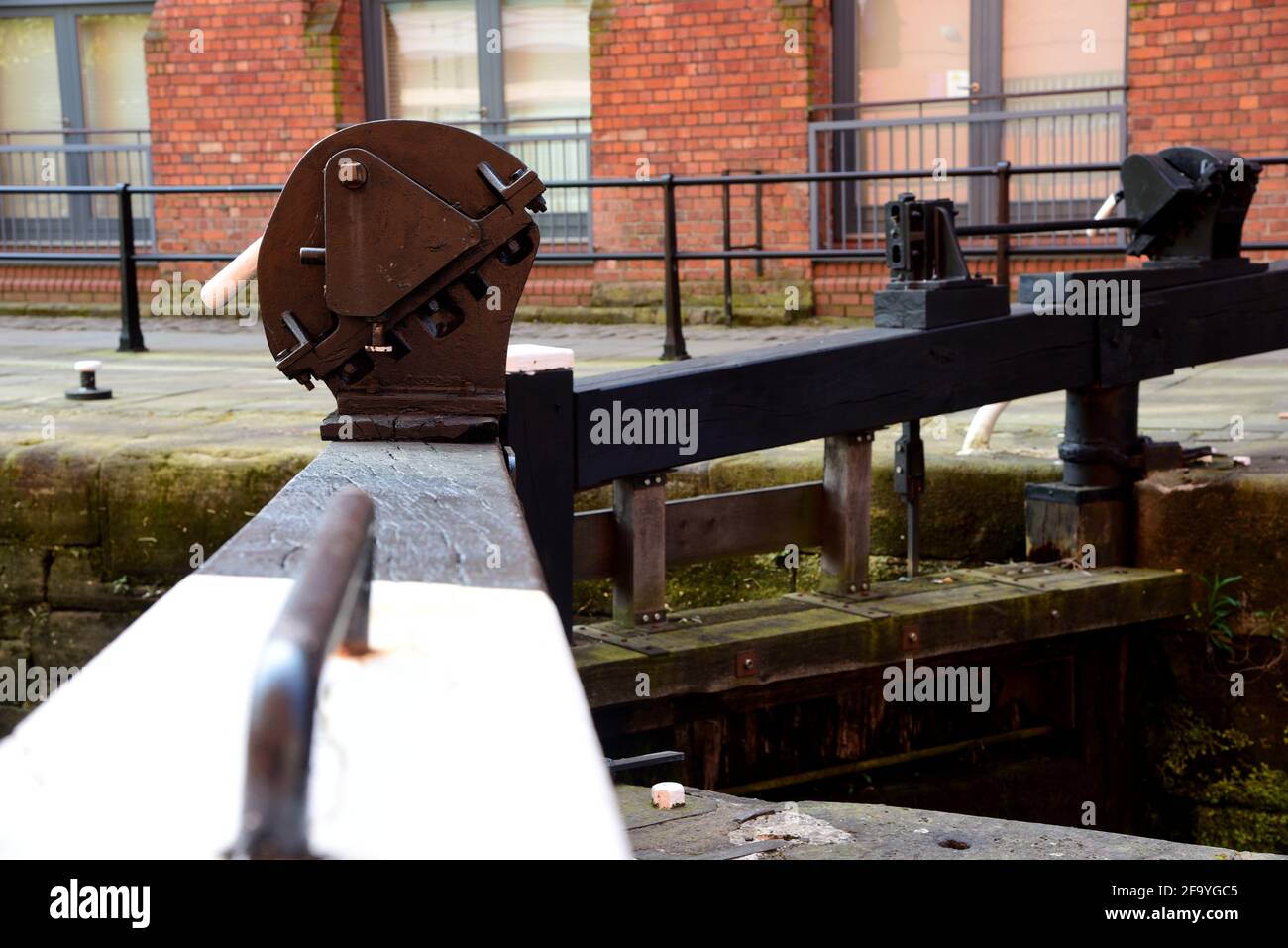 Canal lock gates machinery Stock Photo - Alamy