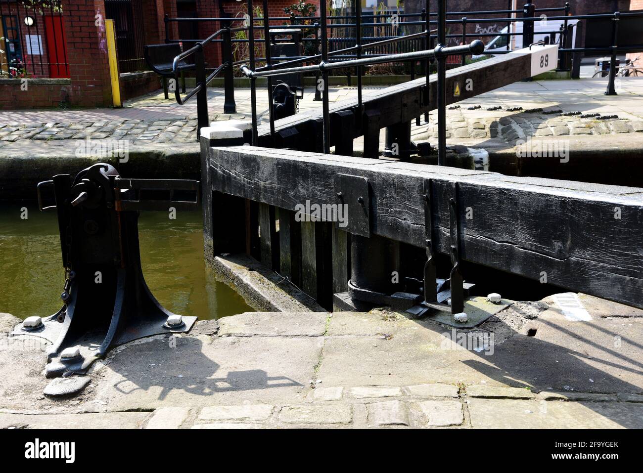Canal lock gates machinery Stock Photo - Alamy