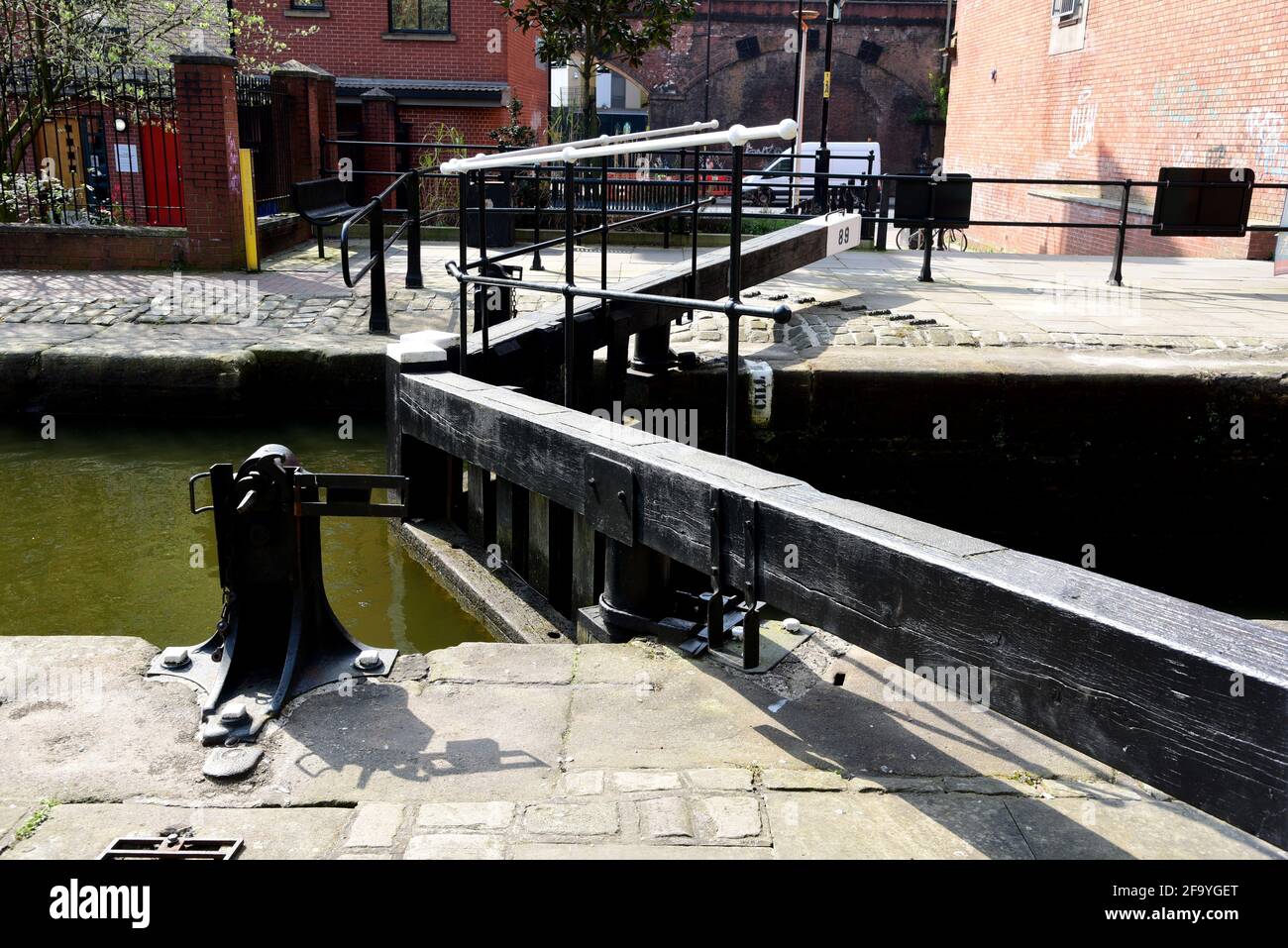 Canal lock gates machinery Stock Photo - Alamy